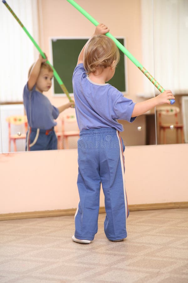 Baby with rod stock photo. Image of work, female, young - 3356532