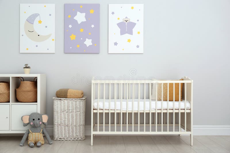 Baby Room with Crib and Cute Posters on Wall Stock Image - Image of ...