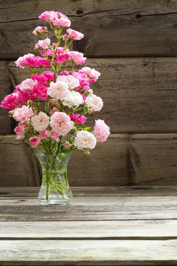 Baby in a bed of roses stock image. Image of hands, kids - 17351247