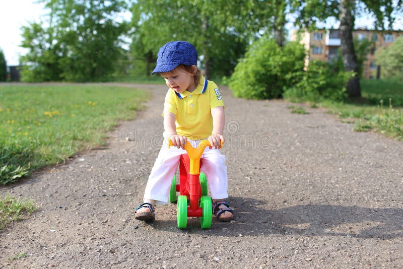 Baby on run bike in summer stock photo. Image of outdoor - 41024106