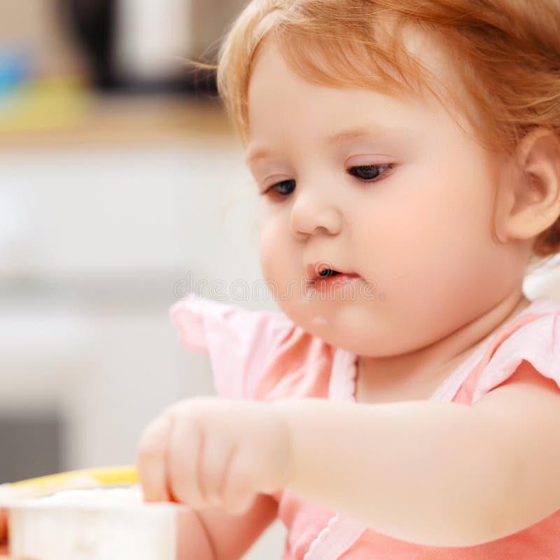 Baby S First Meal. the Child Eats on His Own with a Spoon Stock Image - Image of feeding, chair ...
