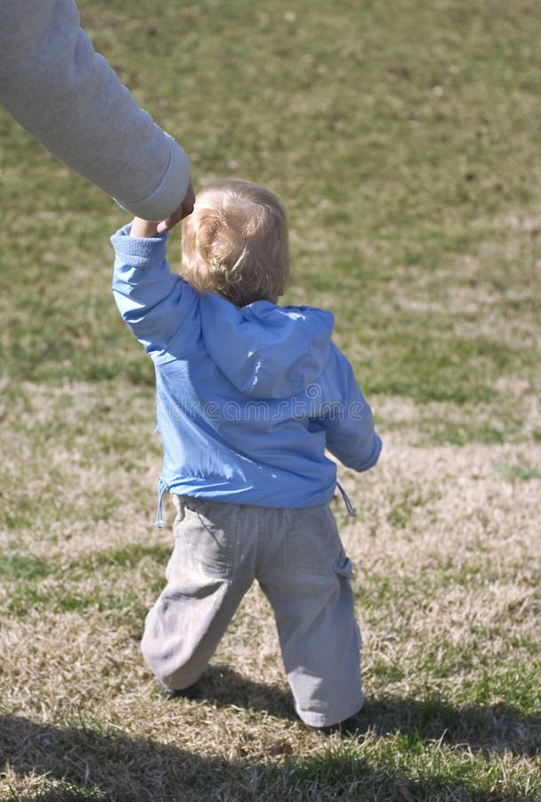 Baby s first steps stock photo. Image of head, year, mother - 549784