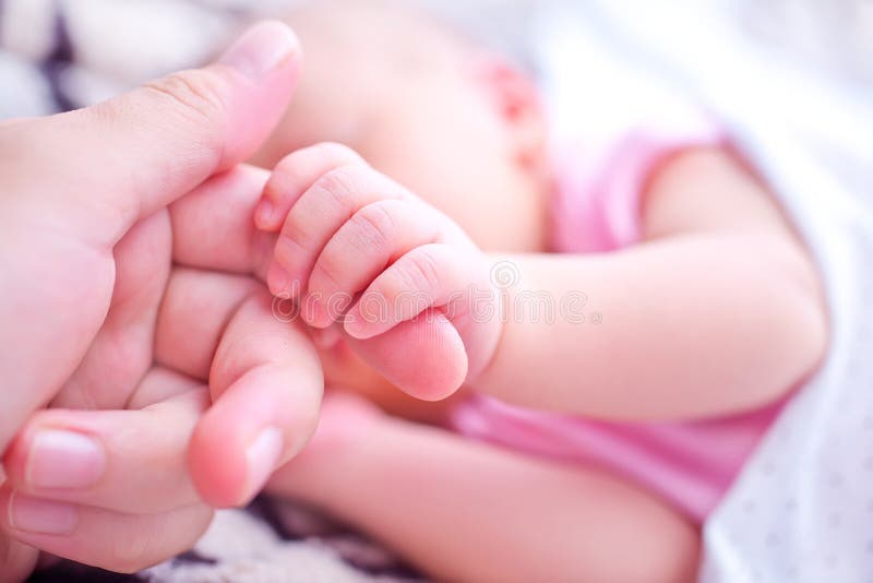 Baby s hand stock image. Image of parenthood, family - 44049297