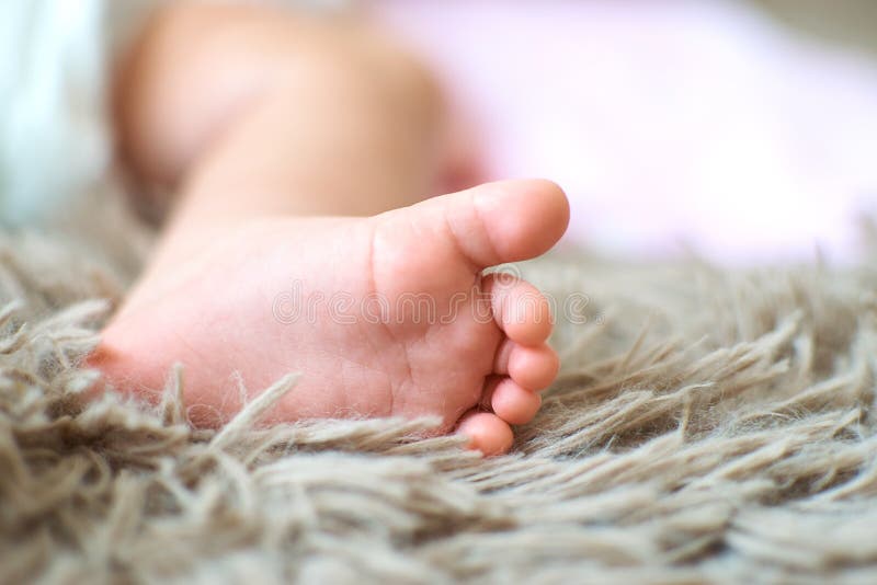 Baby `s Heels on Soft Tuffle Mat Stock Photo - Image of born, foot ...
