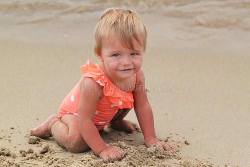 Baby on a sand beach stock image. Image of exotic, coastline - 51004857