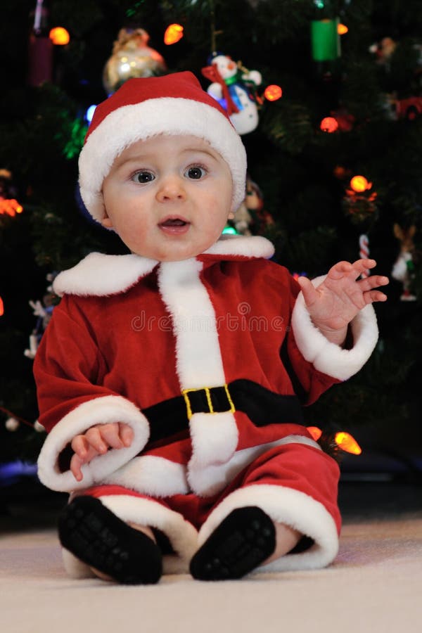 Baby Santa Claus stock photo. Image of person, indoors - 12290836