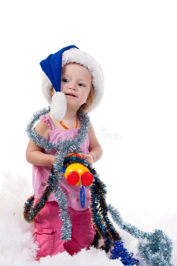 Baby in Santa S Hat in Tinsel and Artificial Snow Stock Photo - Image ...