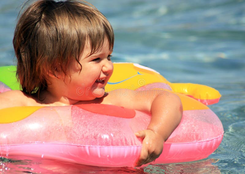 Baby on the sea stock image. Image of female, male, summer - 5743521