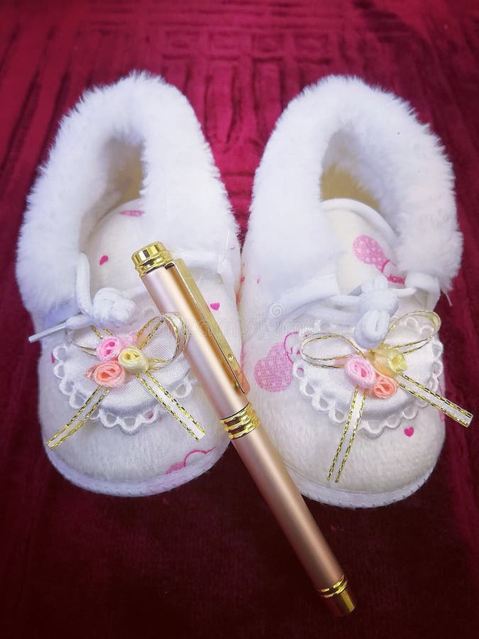Baby shoe girl stock image. Image of flower, organ, shoe - 181321129