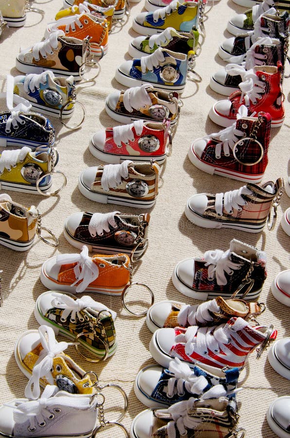 Baby shoe key rings stock image. Image of stall, rows - 5677815