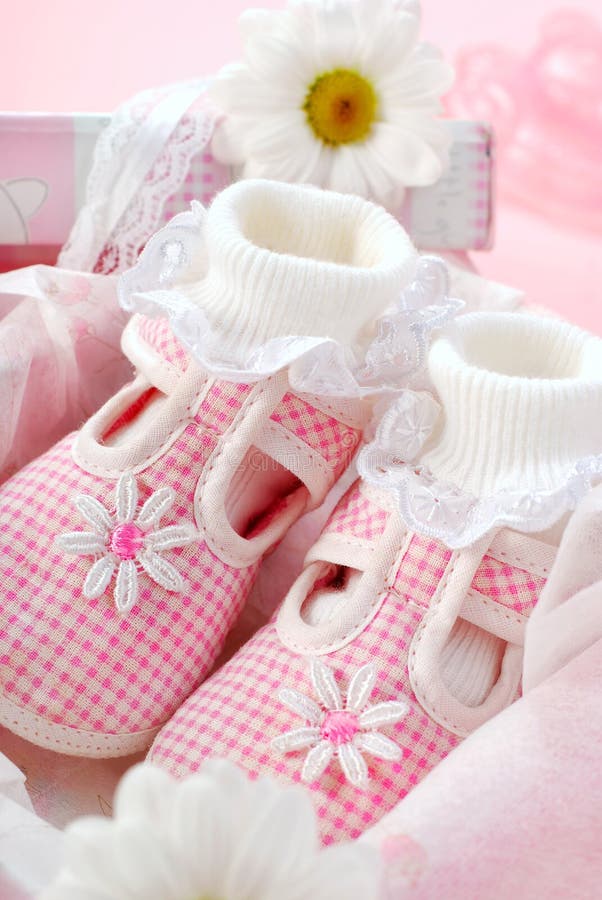 Six Pairs of Baby Shoes on Display Stock Image - Image of baby, stripes ...