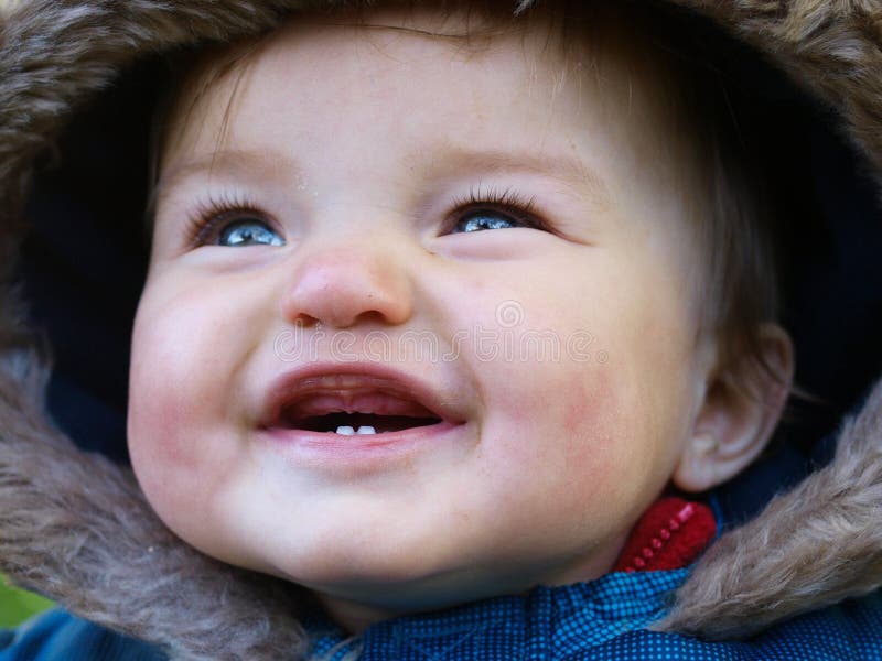 Baby Showing Front Teeth stock image. Image of beautiful - 28979881
