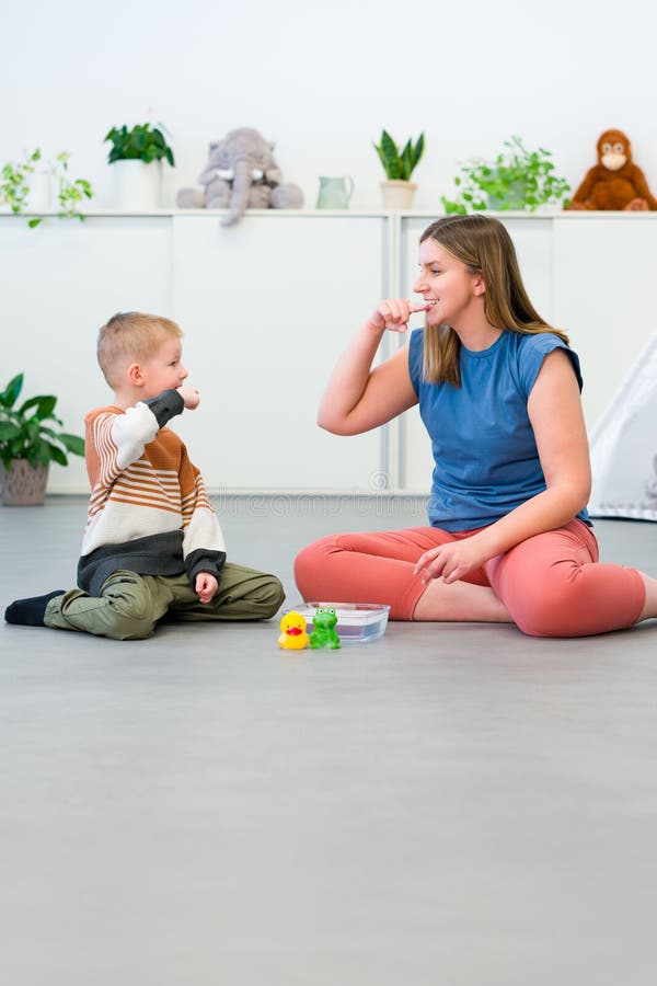 Baby Sign Language. Nonverbal Child Learning To Sign with the Help of a ...