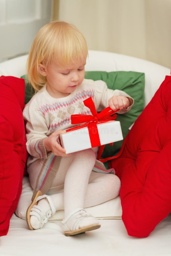 Baby Sitting on Chair and Open Christmas Gift Box Stock Photo - Image ...