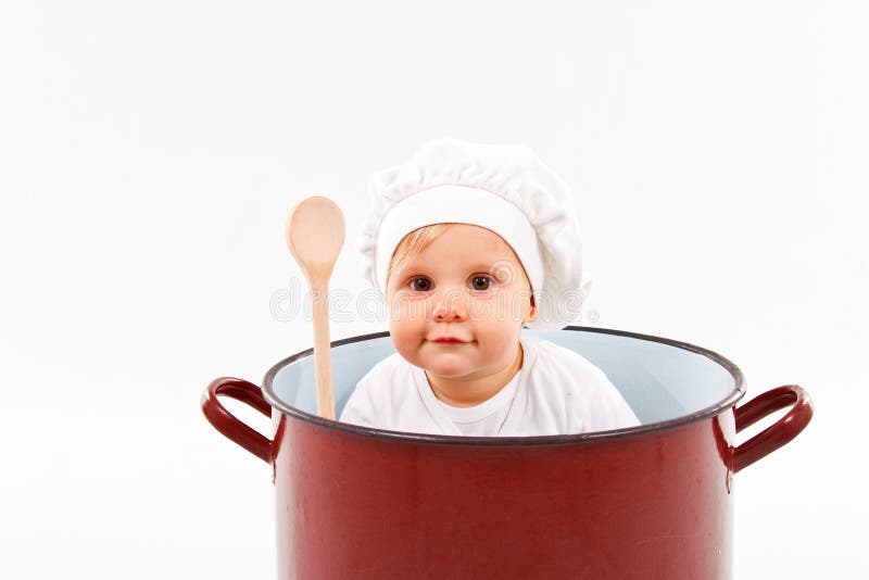 Baby sitting inside a pot stock photo. Image of cooking - 40900556