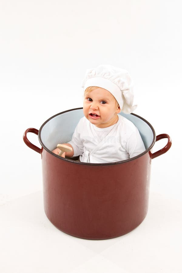 Baby sitting inside a pot stock image. Image of child - 40900557