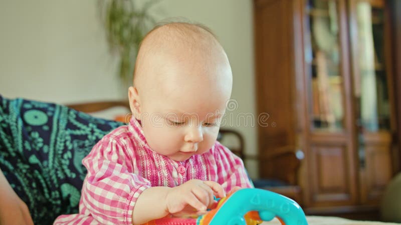 Baby Sitting Being Supported By Her Mother Stock Image - Image of cute ...