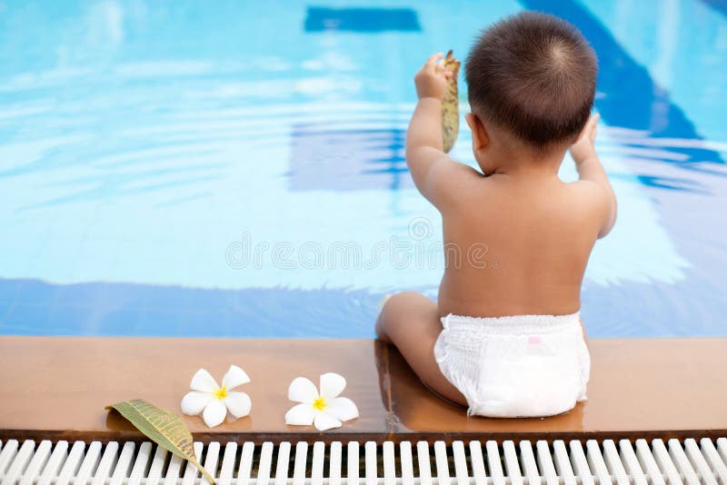 Baby Sitting Side of the Pool Stock Image - Image of positive, white ...