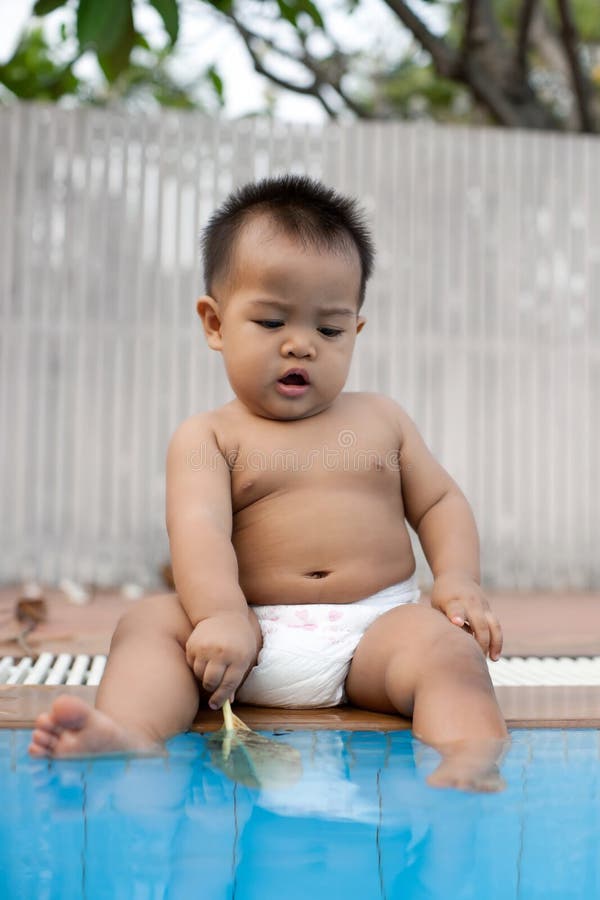 Baby Sitting Side of the Pool Stock Photo - Image of baby, small: 29259872