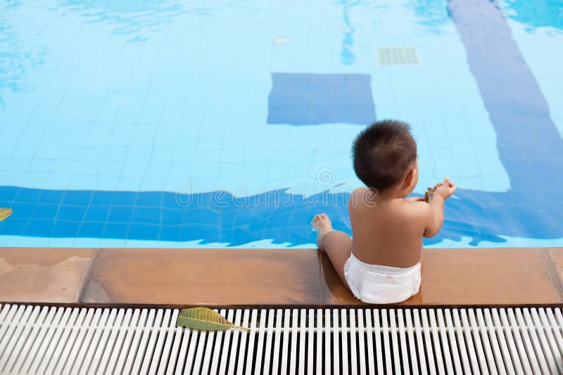 Baby Sitting Side of the Pool Stock Photo - Image of young, human: 29267546
