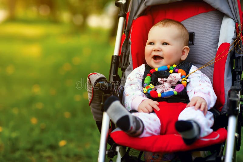 Baby in sitting stroller stock image. Image of childhood - 19725043