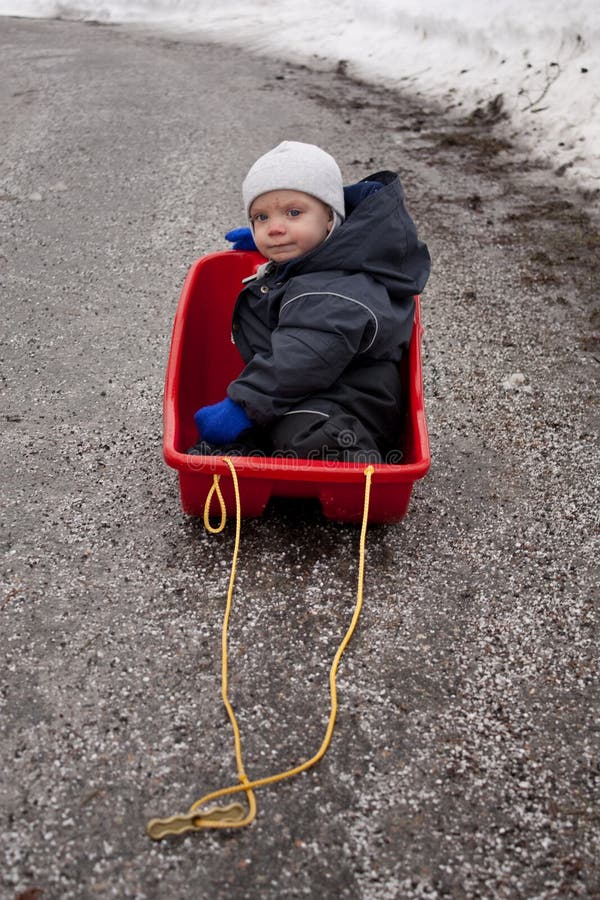 Baby in sled stock photo. Image of longing, winter, longs - 16884174