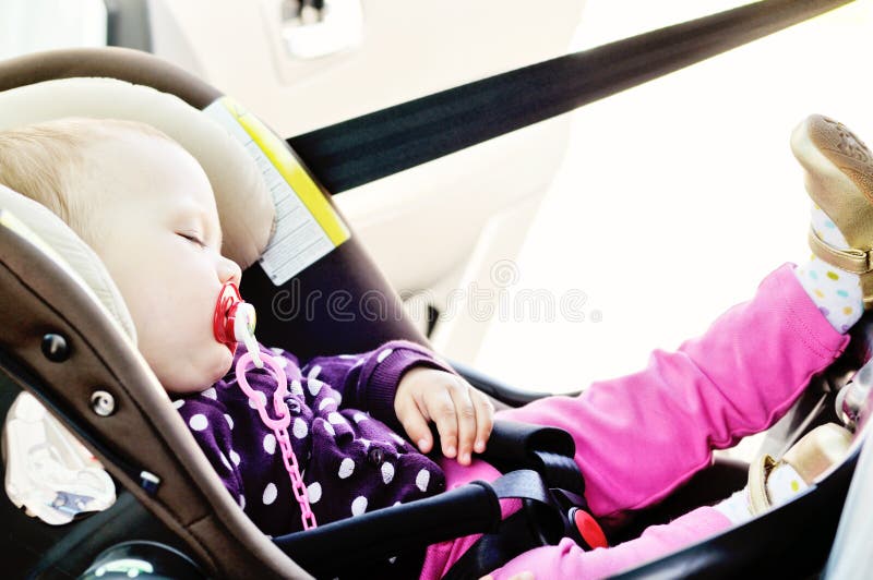 Baby sleeping in the car stock photo. Image of children - 15112562