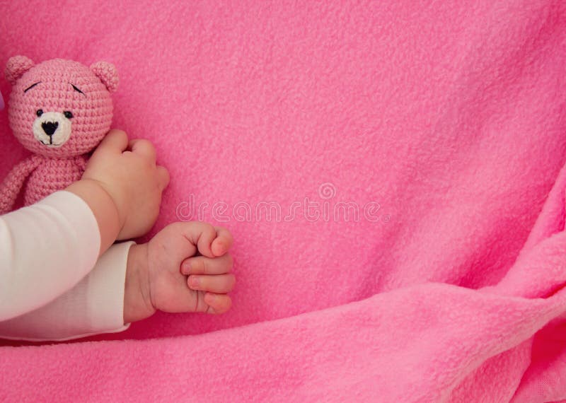 Baby Sleeping on a Pink Background with a Pink Teddy Bear.child Stock ...