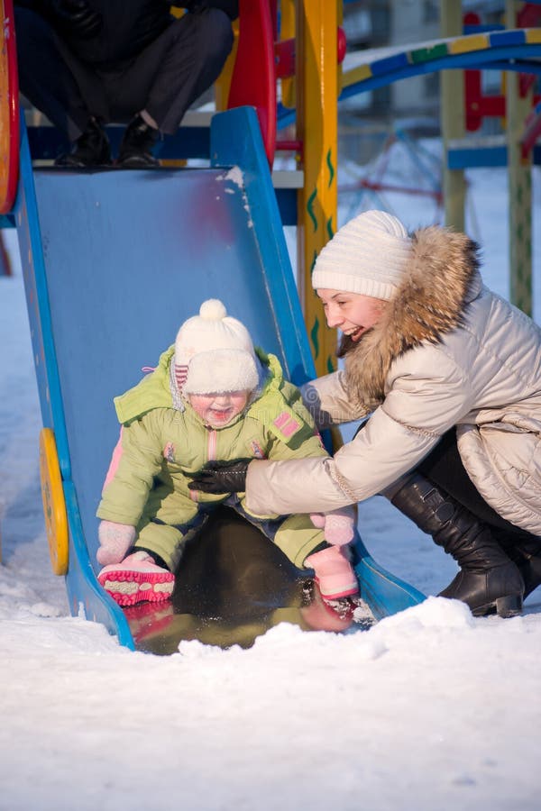 Baby Slide Down Mother Catch Playground Stock Photos - Free & Royalty ...