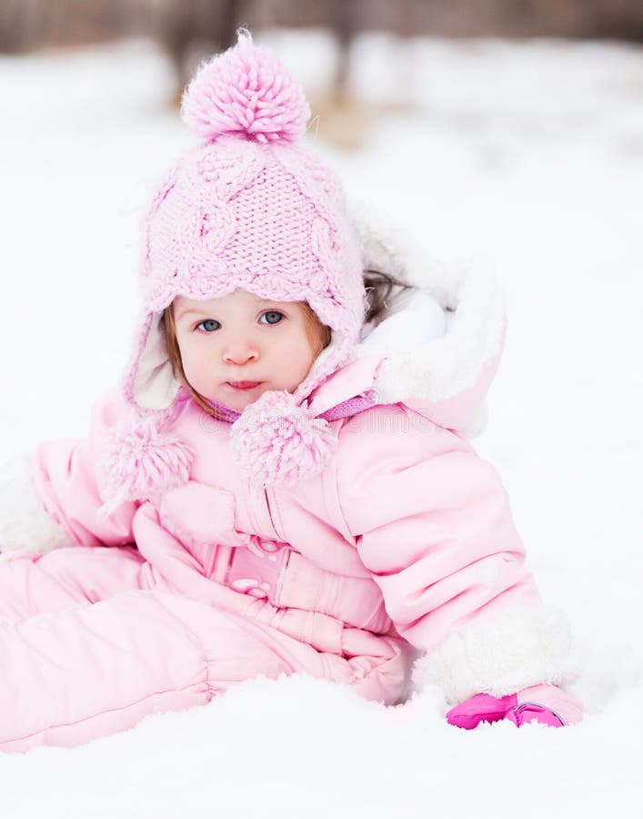 Baby on the snow stock image. Image of young, park, snowdrifts - 22309675