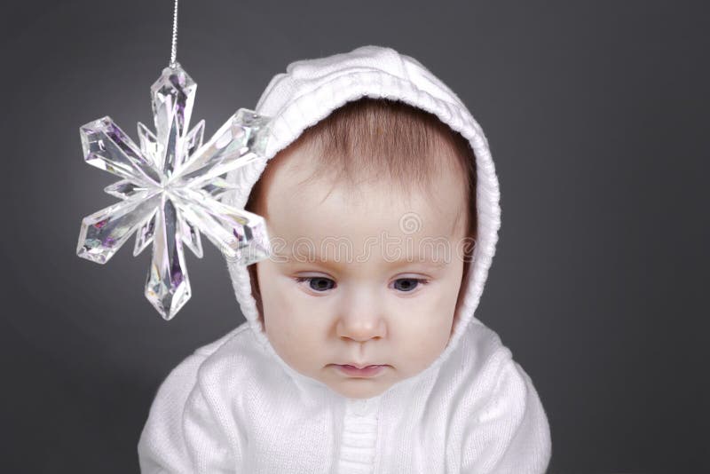 Baby with snow flake stock photo. Image of adorable, childhood - 27631734
