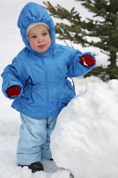 Baby with snowball stock photo. Image of kids, cold, portrait - 1705498