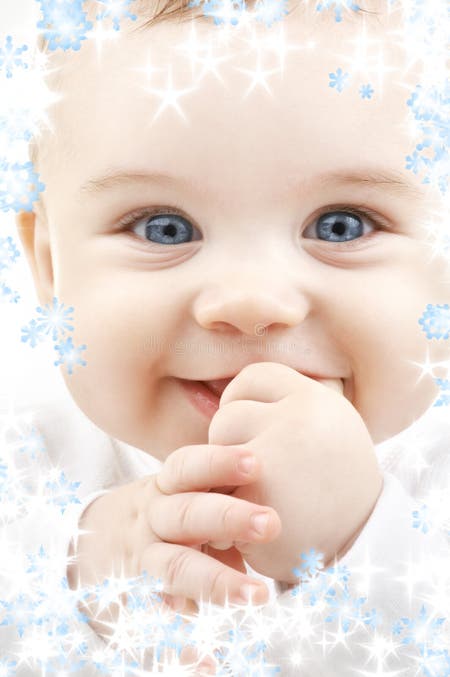 Baby with snowflakes stock photo. Image of jolly, face - 6177350