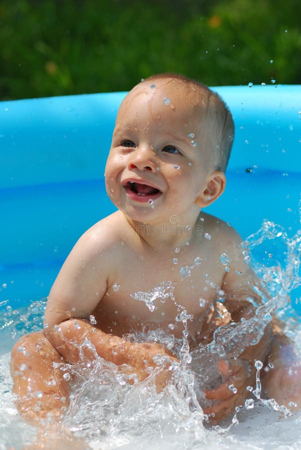 Baby with splashes stock photo. Image of aqua, swimming - 6110662