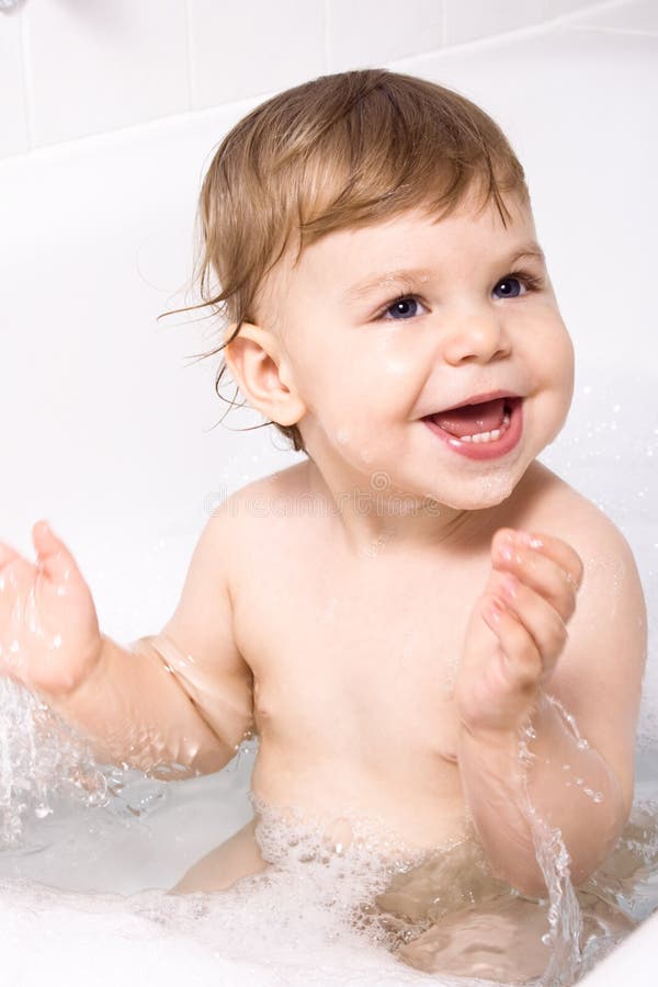 Baby Splashing at Pool stock photo. Image of young, splash - 20139748