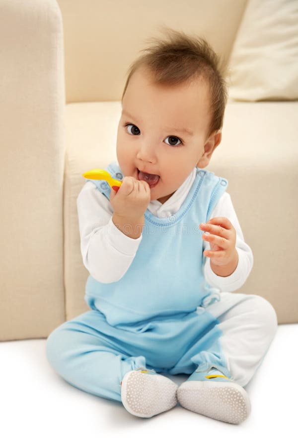 Baby with spoon stock photo. Image of happy, look, person - 23425540