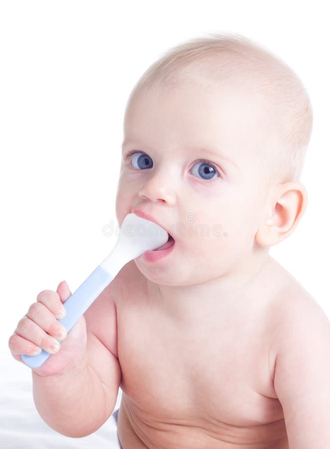 Baby with spoon stock photo. Image of people, feeding - 27865812