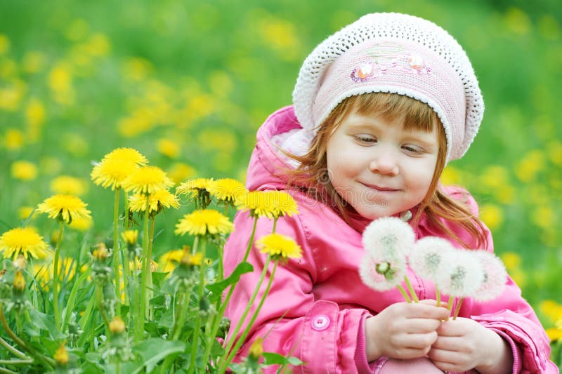 Blond Little Girl Blowing a Dandelion Stock Image - Image of blossom ...