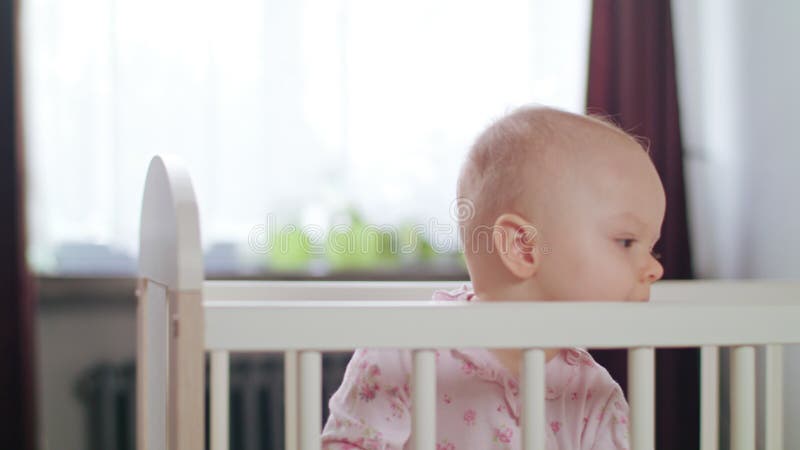 Baby Standing in a Crib at Home Stock Photo - Image of happy, healthy ...