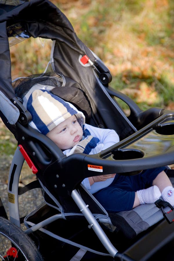 Baby in Stroller stock image. Image of sitting, stroller - 7440175