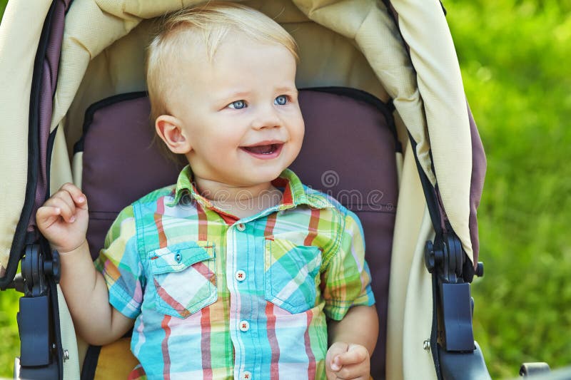 Baby in the stroller stock photo. Image of smiling, happiness - 39902348