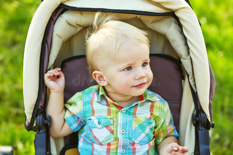 Baby in the stroller stock image. Image of human, nature - 71774561