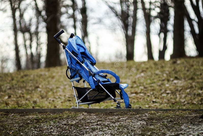 Baby Stroller in Spring Park Stock Photo - Image of smooth, modern ...