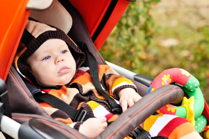 Baby in the stroller stock image. Image of looking, fall - 42706095