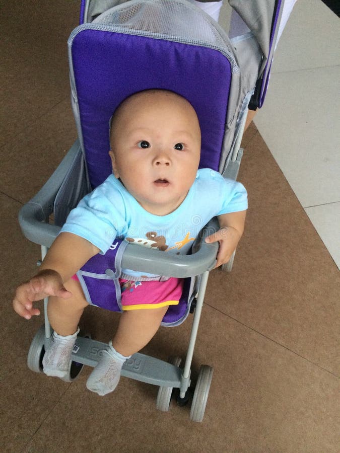 Baby in stroller stock image. Image of camera, stroller - 42980467