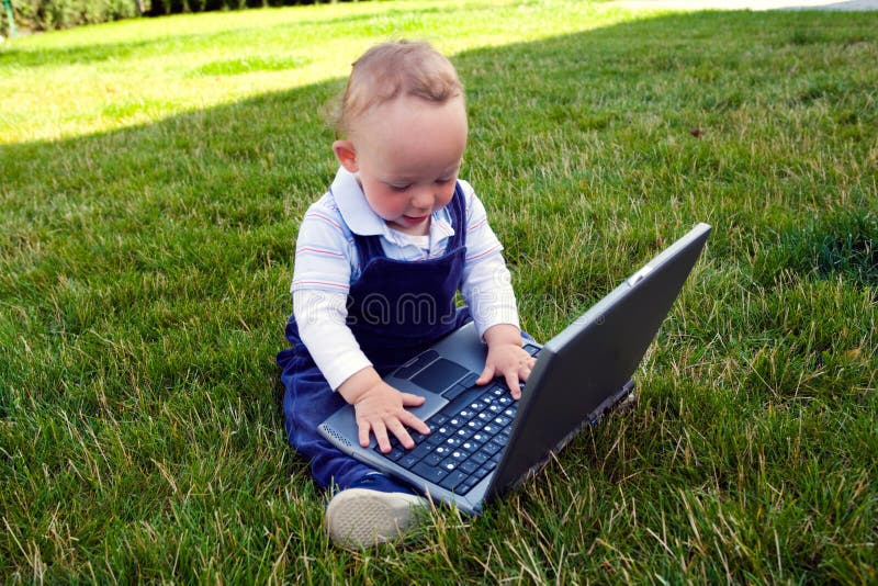 Baby study on computer stock photo. Image of child, smiling - 2994056