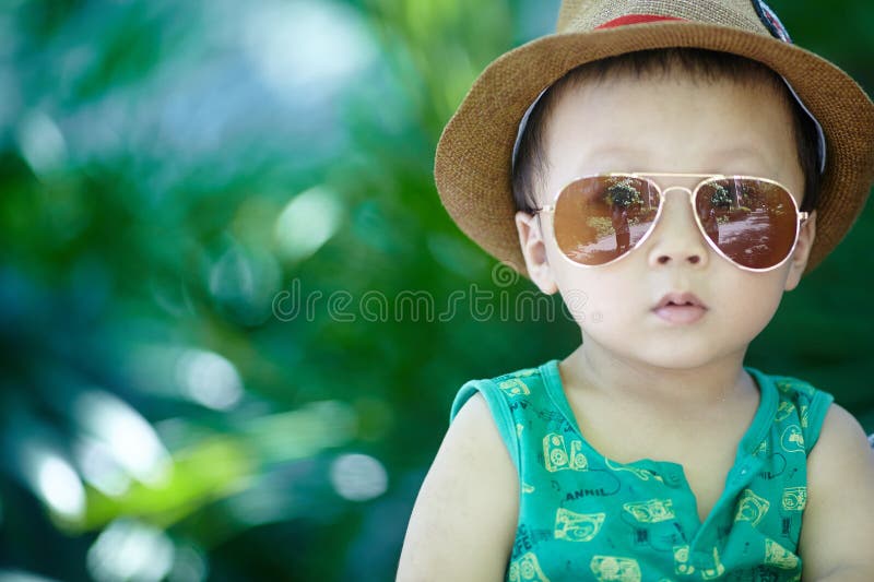 Baby in sun glasses stock photo. Image of face, hair - 56872358