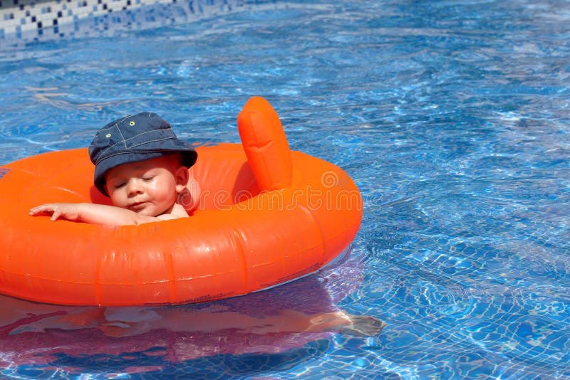 A Baby in the Swimming Pool Stock Image - Image of swimming, reflection ...