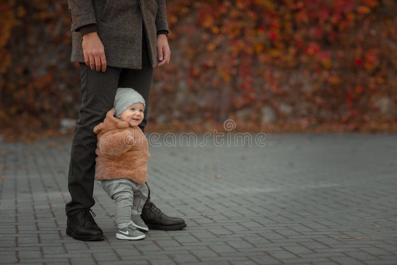 Baby Takes First Steps with Father`s Help Stock Photo - Image of baby ...