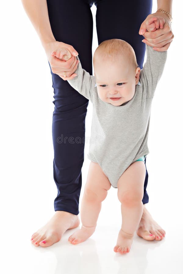 Baby taking first steps stock image. Image of happy, people - 33251889